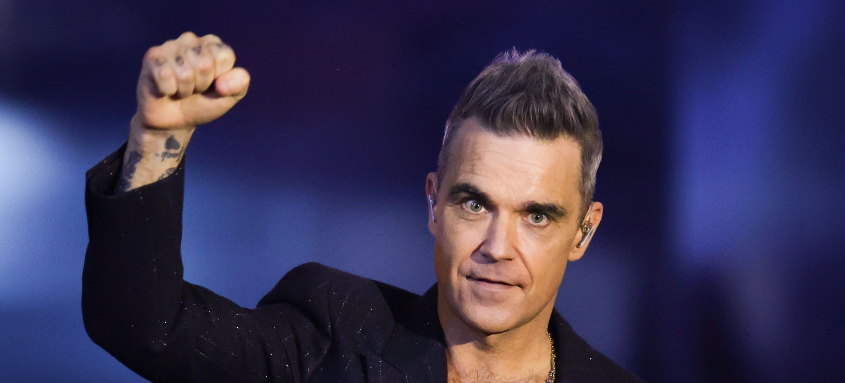 "El éxito y controversia detrás de Rock DJ, el icónico hit de Robbie ...